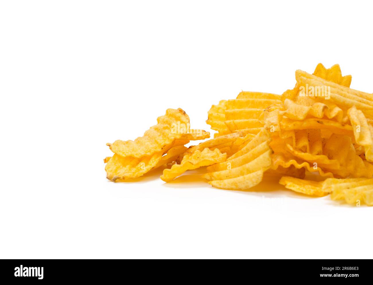 yellow potato chips isolated on white Stock Photo - Alamy