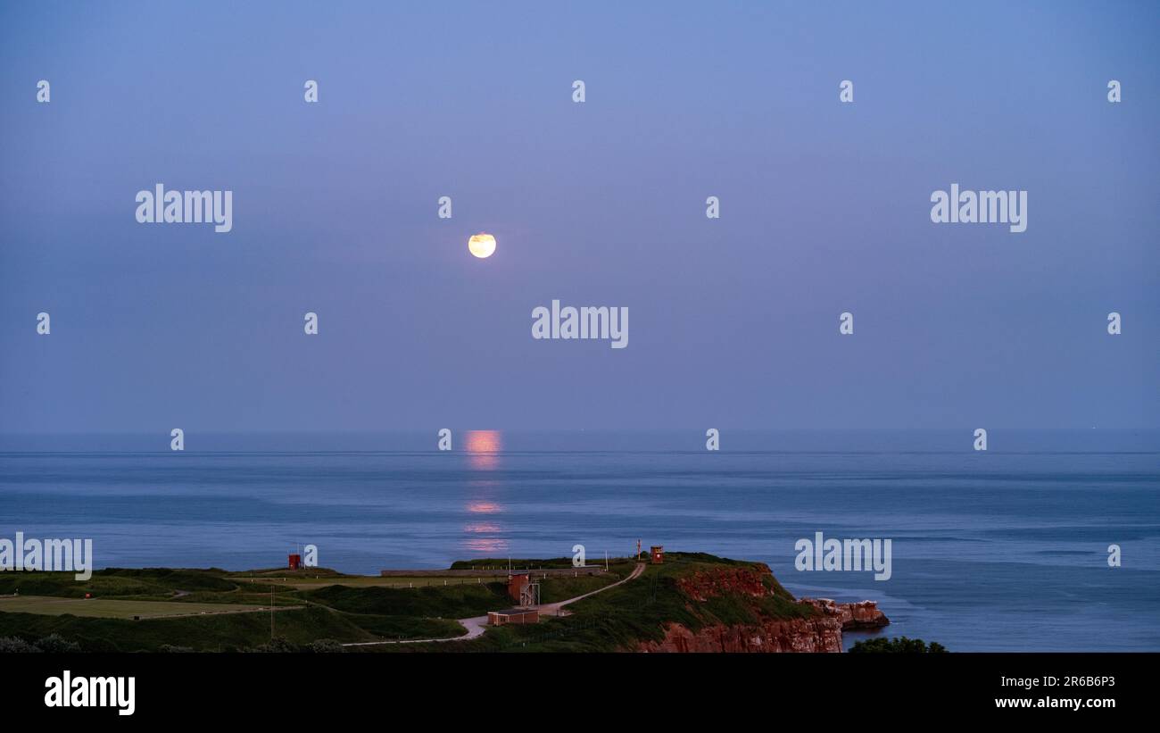 MOON RISE OVER DEVON CLIFFS Stock Photo - Alamy
