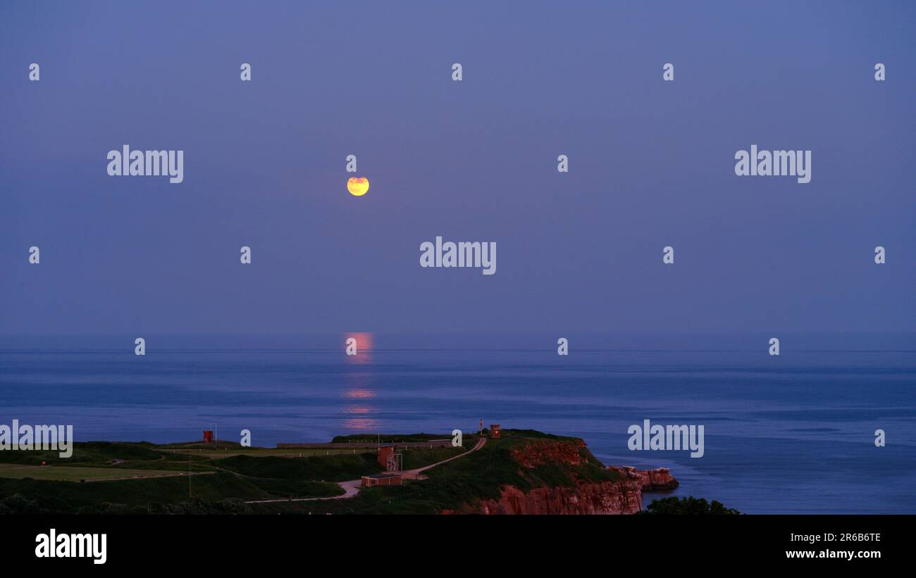 MOON RISE OVER DEVON CLIFFS Stock Photo - Alamy