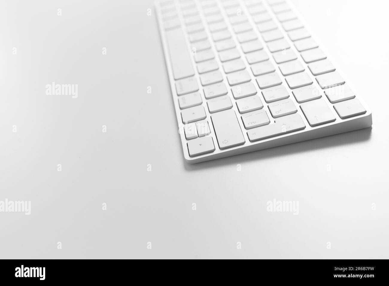 Office table with keyboard Isolated on white background Stock Photo - Alamy