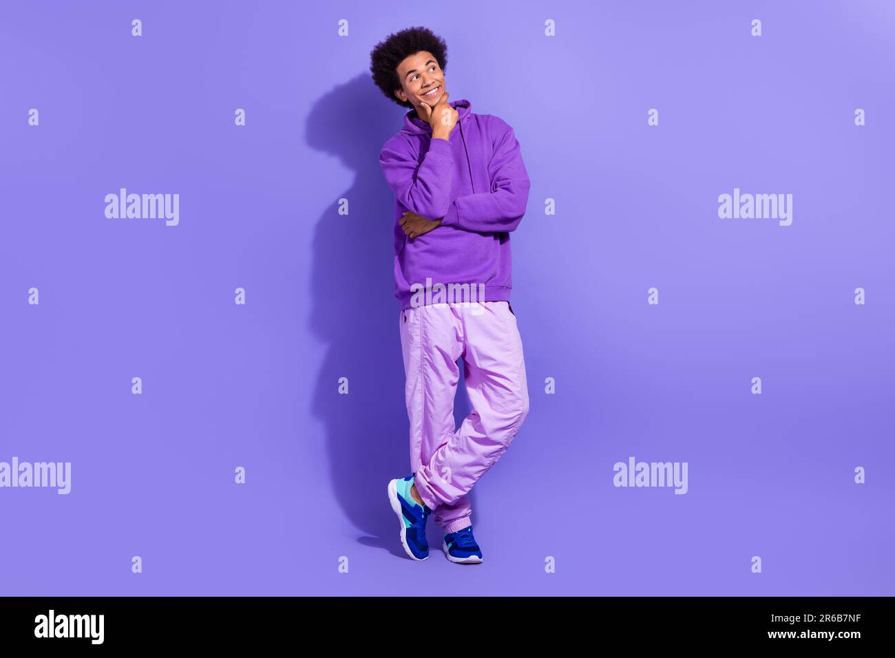 Full size photo of ponder pensive person wear violet hoodie sport pants ...