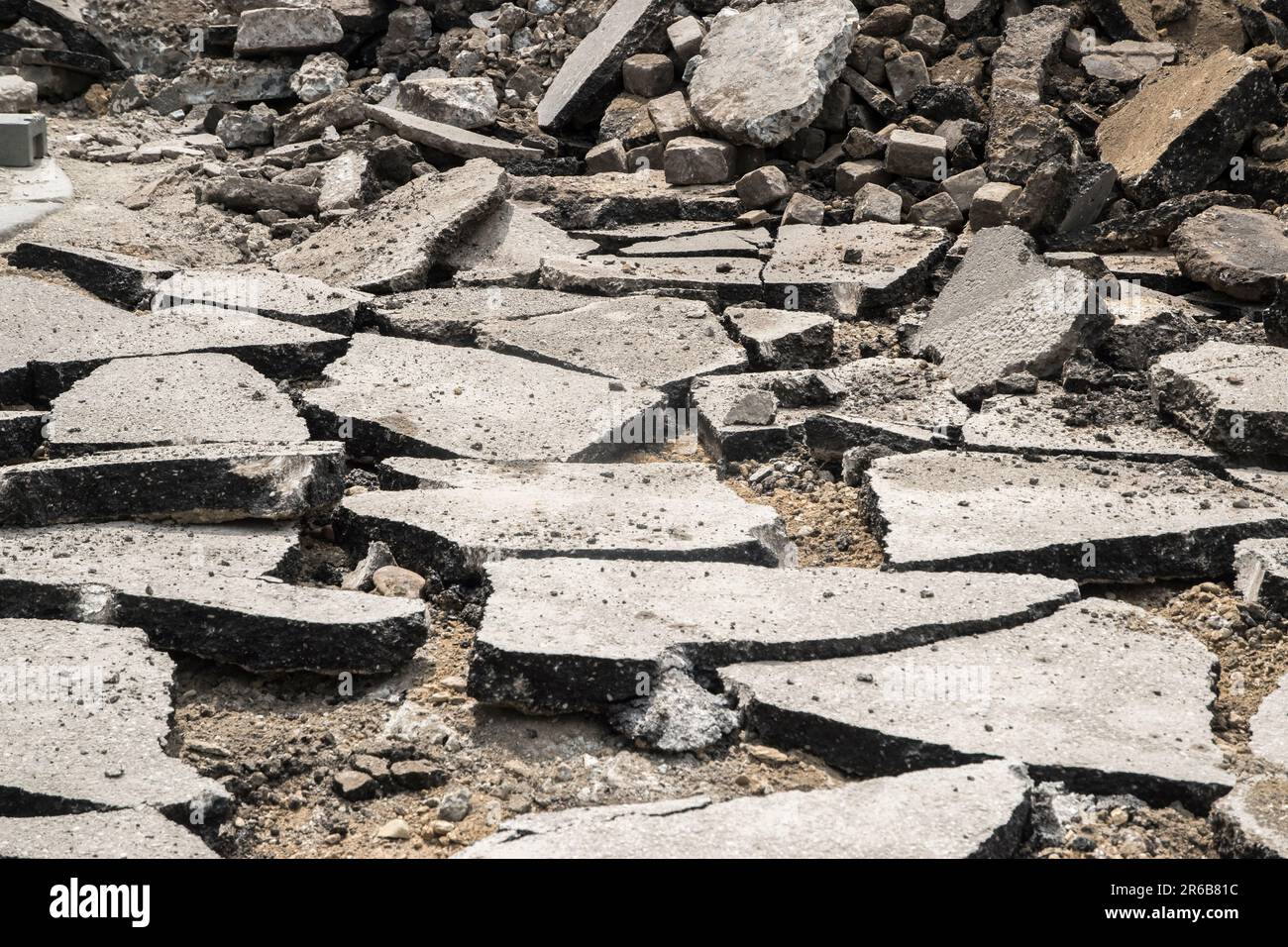 Asphalt road surface broken into pieces during road repair works Stock ...