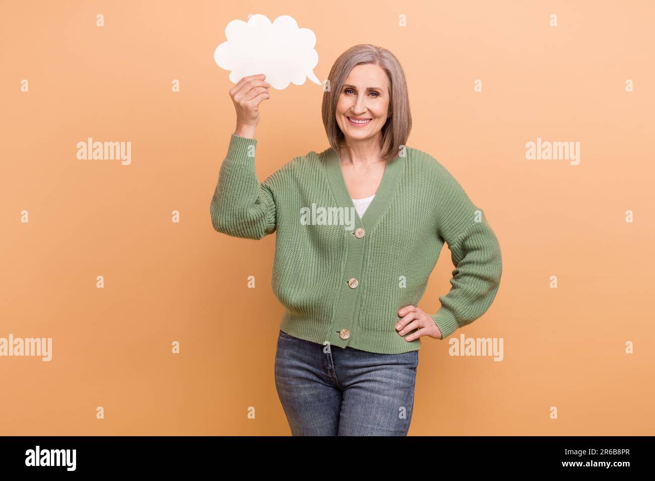Photo of satisfied old senior business developer woman hold paper ...