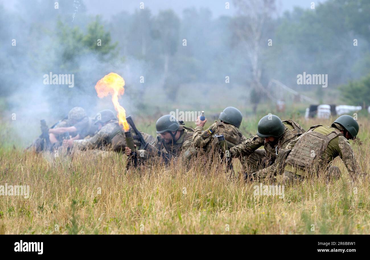KYIV, UKRAINE - JUNE 7, 2023 - Soldiers fire mortars during a military ...