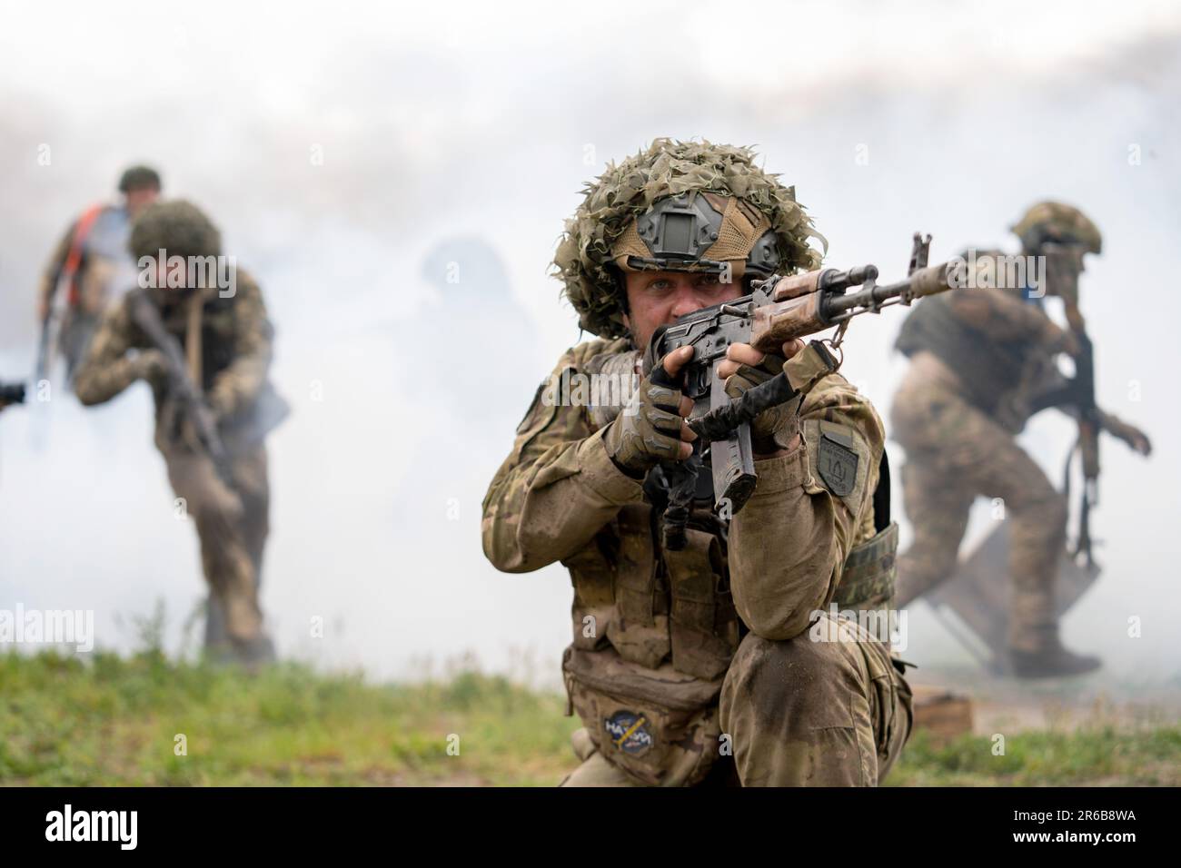 KYIV, UKRAINE - JUNE 7, 2023 - A soldier aims a rifle during a military ...