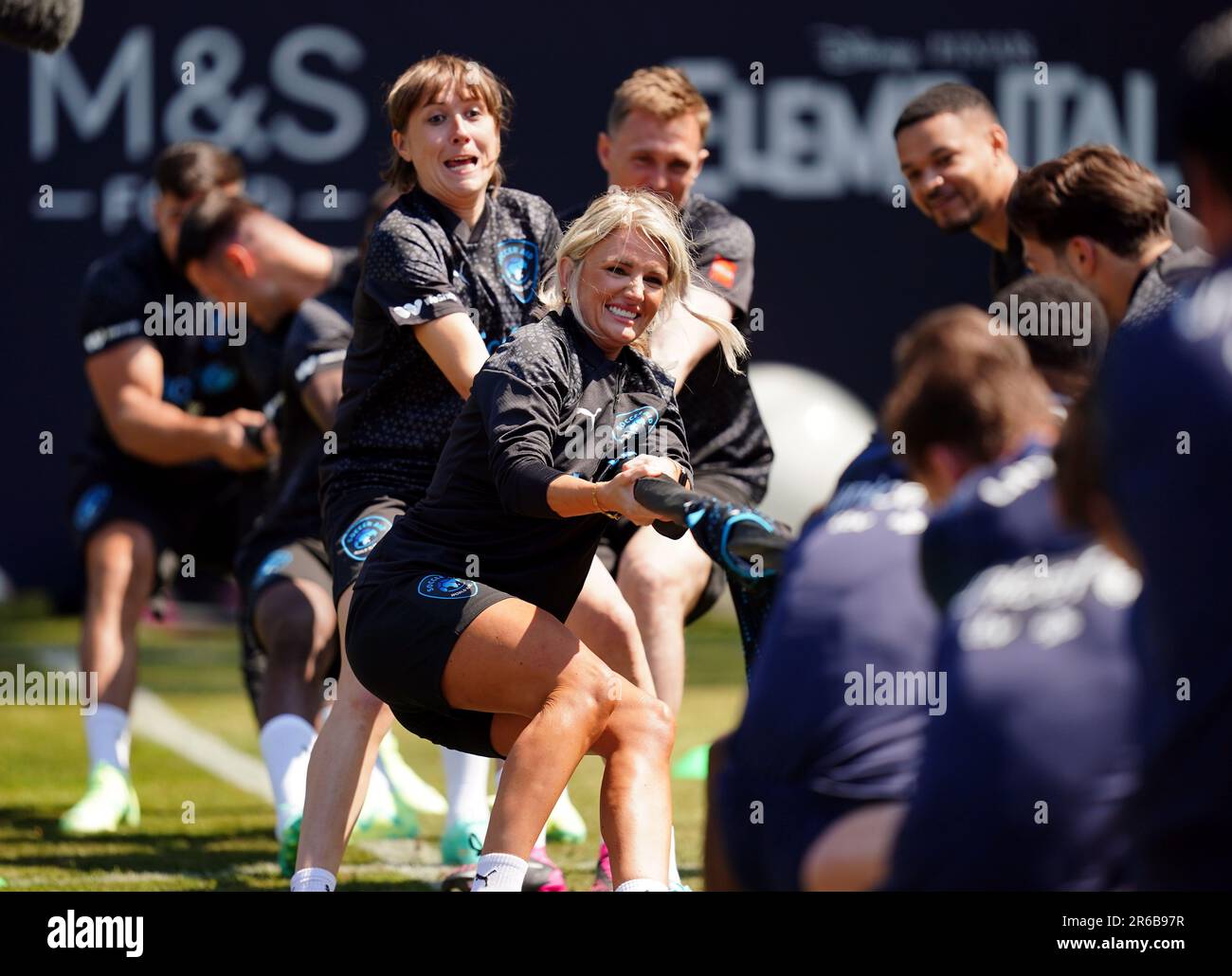 World XI's Kaylyn Kyle and Maisie Adam lead their team in a tug of war ...
