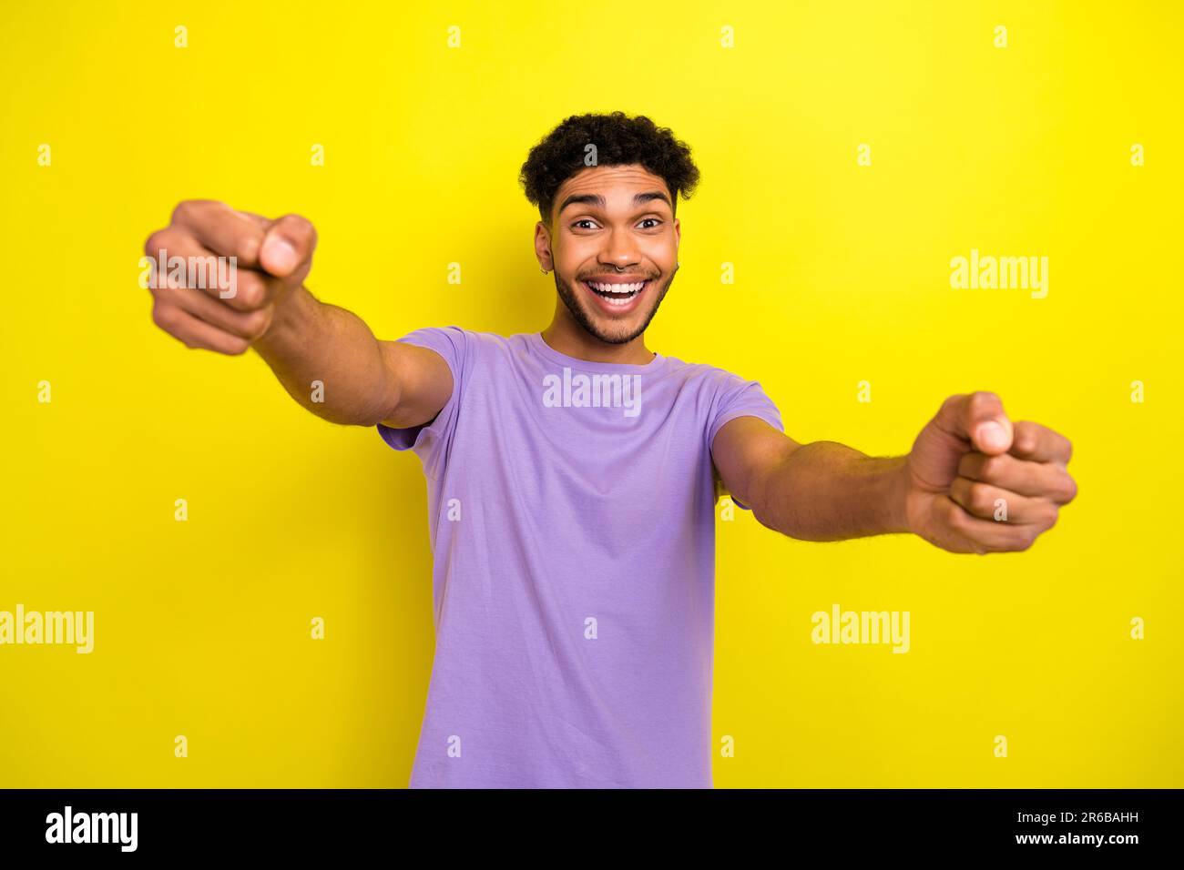 Photo of cheerful excited person toothy smile hands steering imagine ...