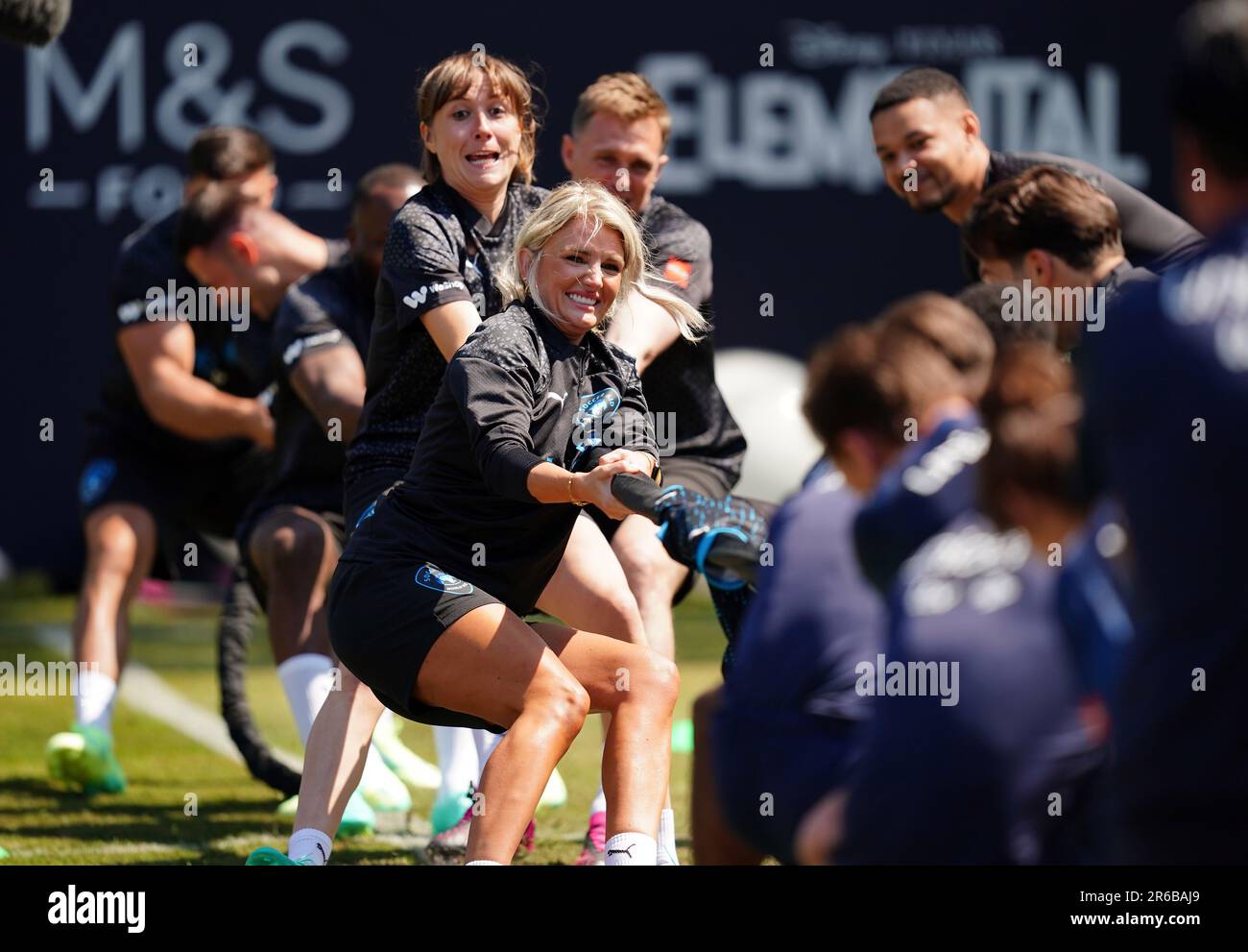 World XI's Kaylyn Kyle and Maisie Adam lead their team in a tug of war ...