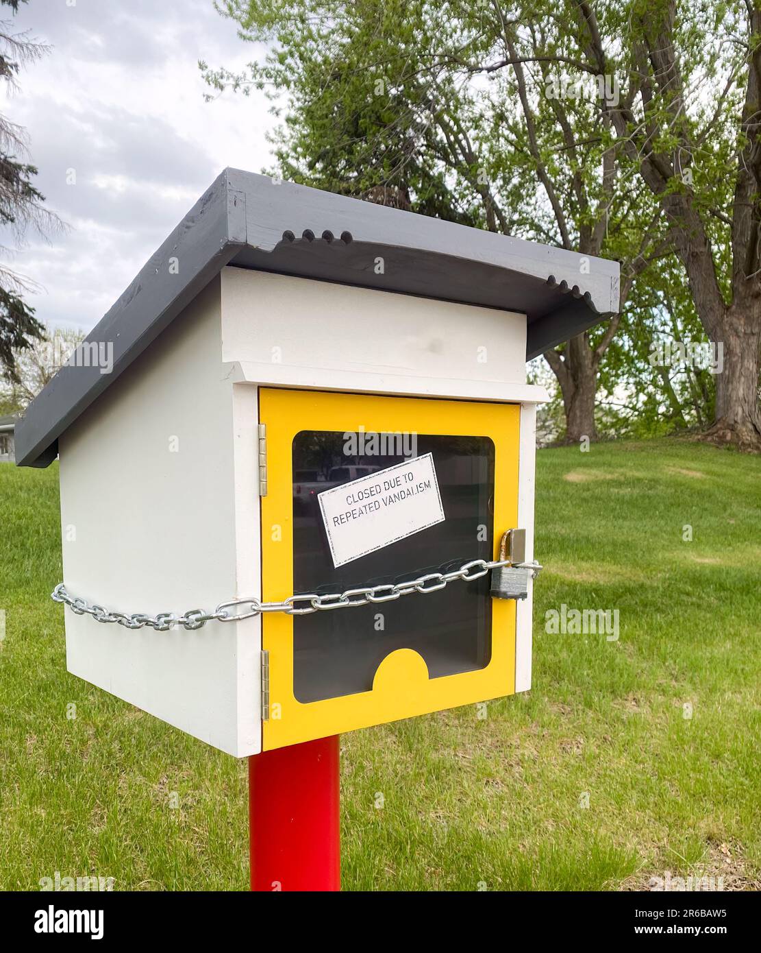 Little free library closed and locked due to vandalism Stock Photo - Alamy