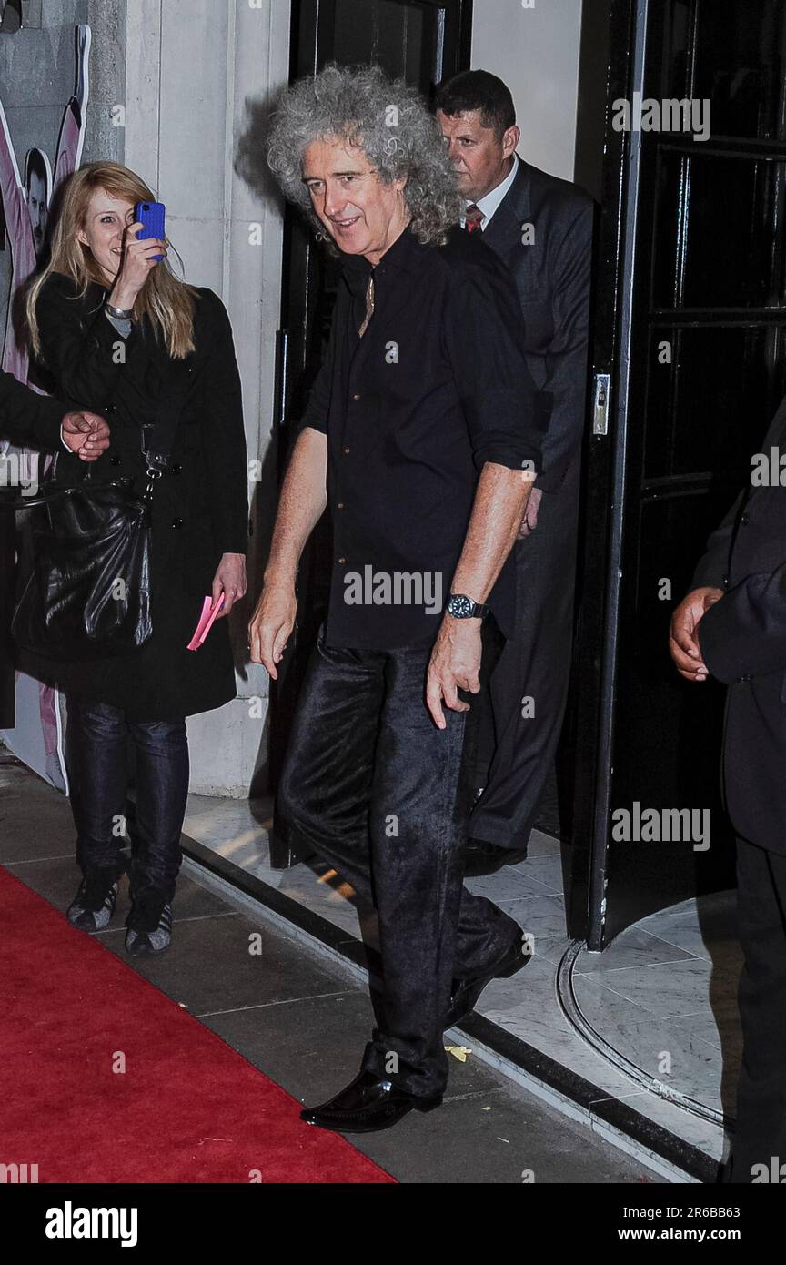 Queen guitarist Brian May greets fans outside a London hotel. Credit ...