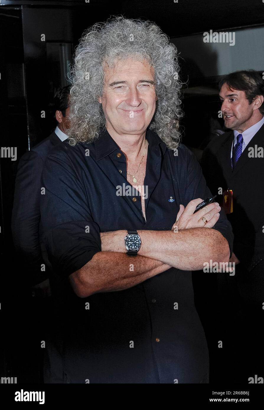 Queen guitarist Brian May greets fans outside a London hotel. Credit ...