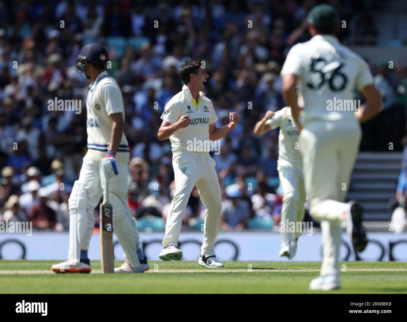 Australia's Pat Cummins celebrates after dismissing India's Rohit ...