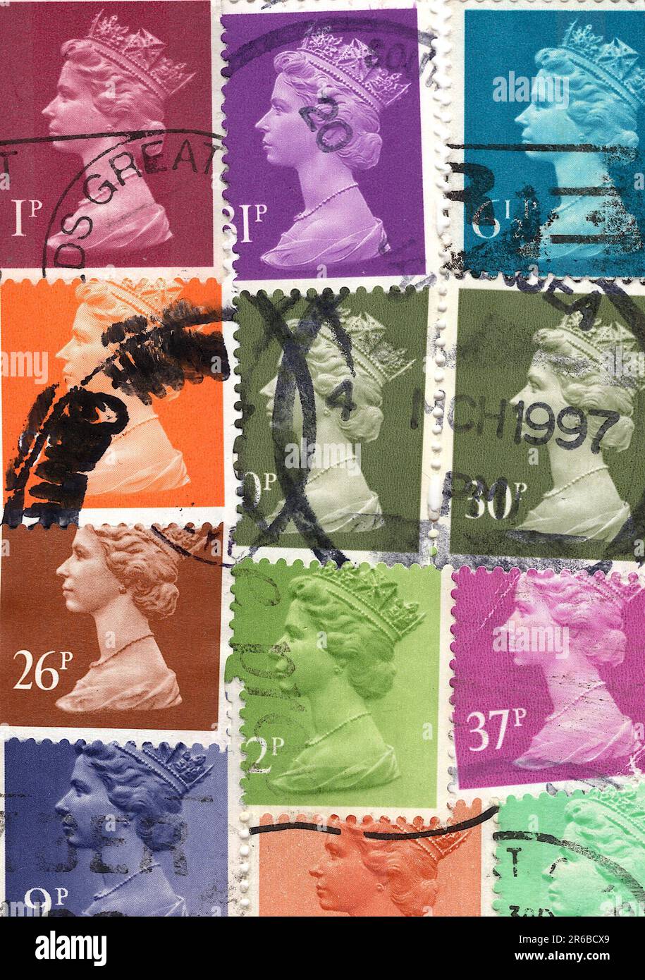 A montage of multi coloured vintage postage stamps from the United ...