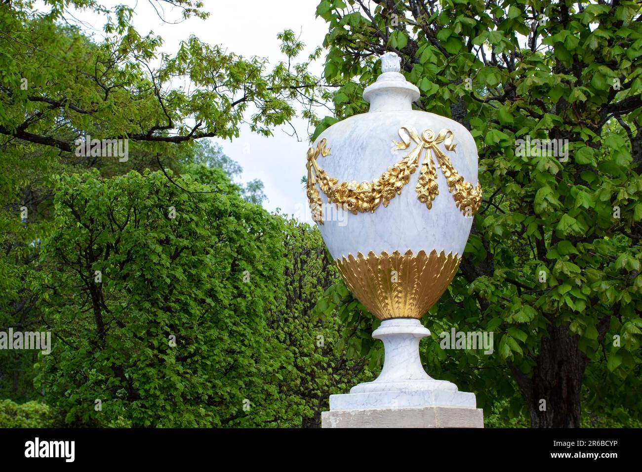 Vase of white marble with gilding. Installed in the alley in the lower ...