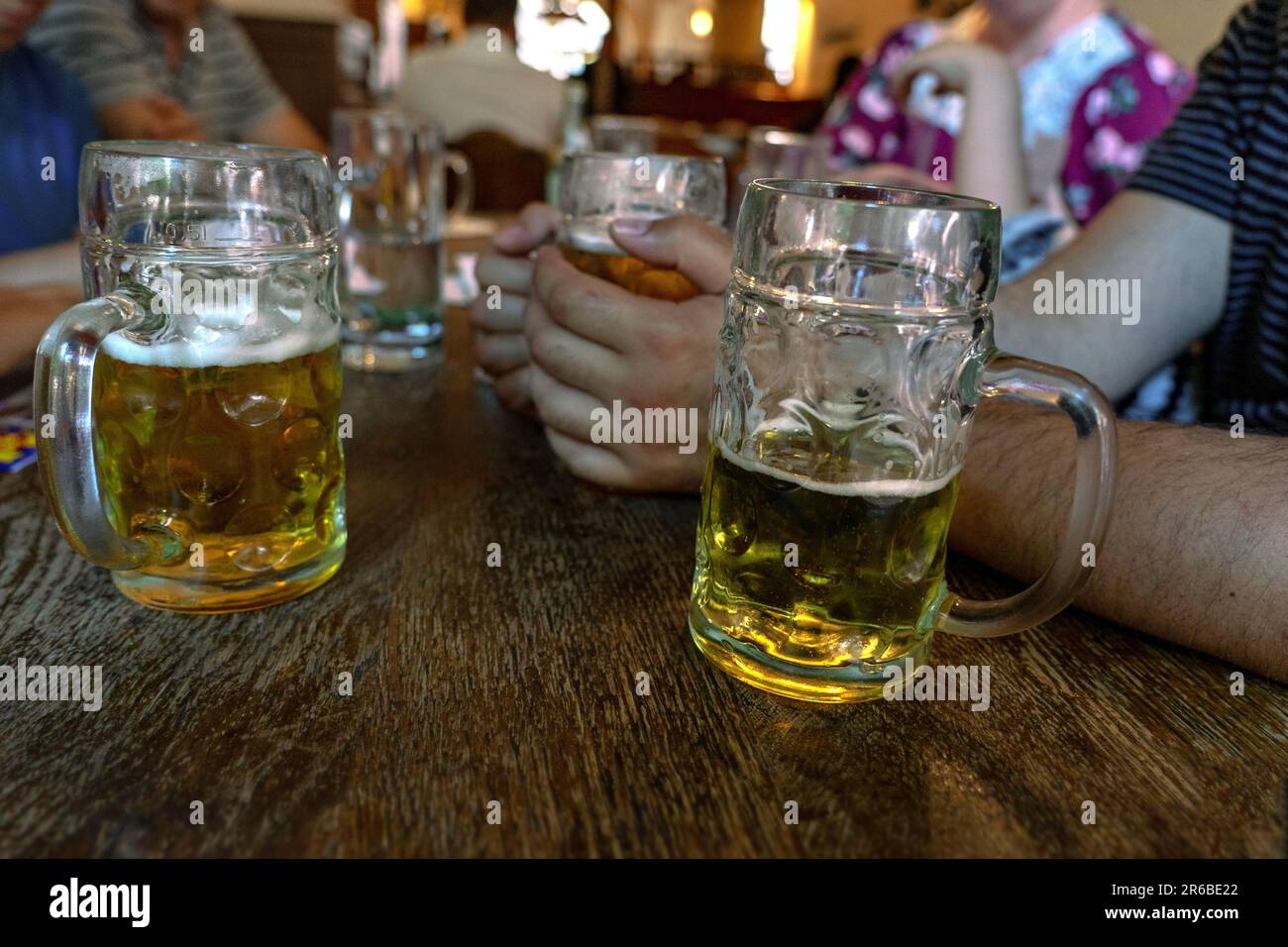 drinking bier in a traditional biergarten in Munich Germany Stock Photo ...