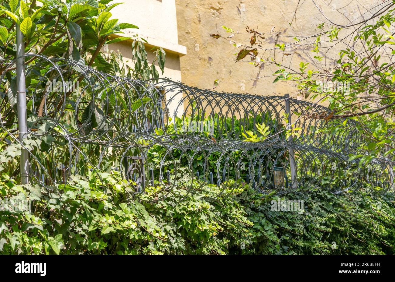 Razor wire fencing security hi-res stock photography and images - Alamy