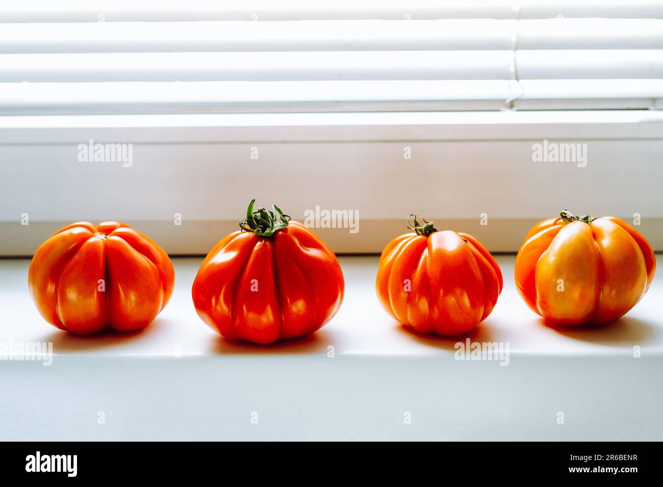 Unusual shaped tomatoes hi-res stock photography and images - Alamy