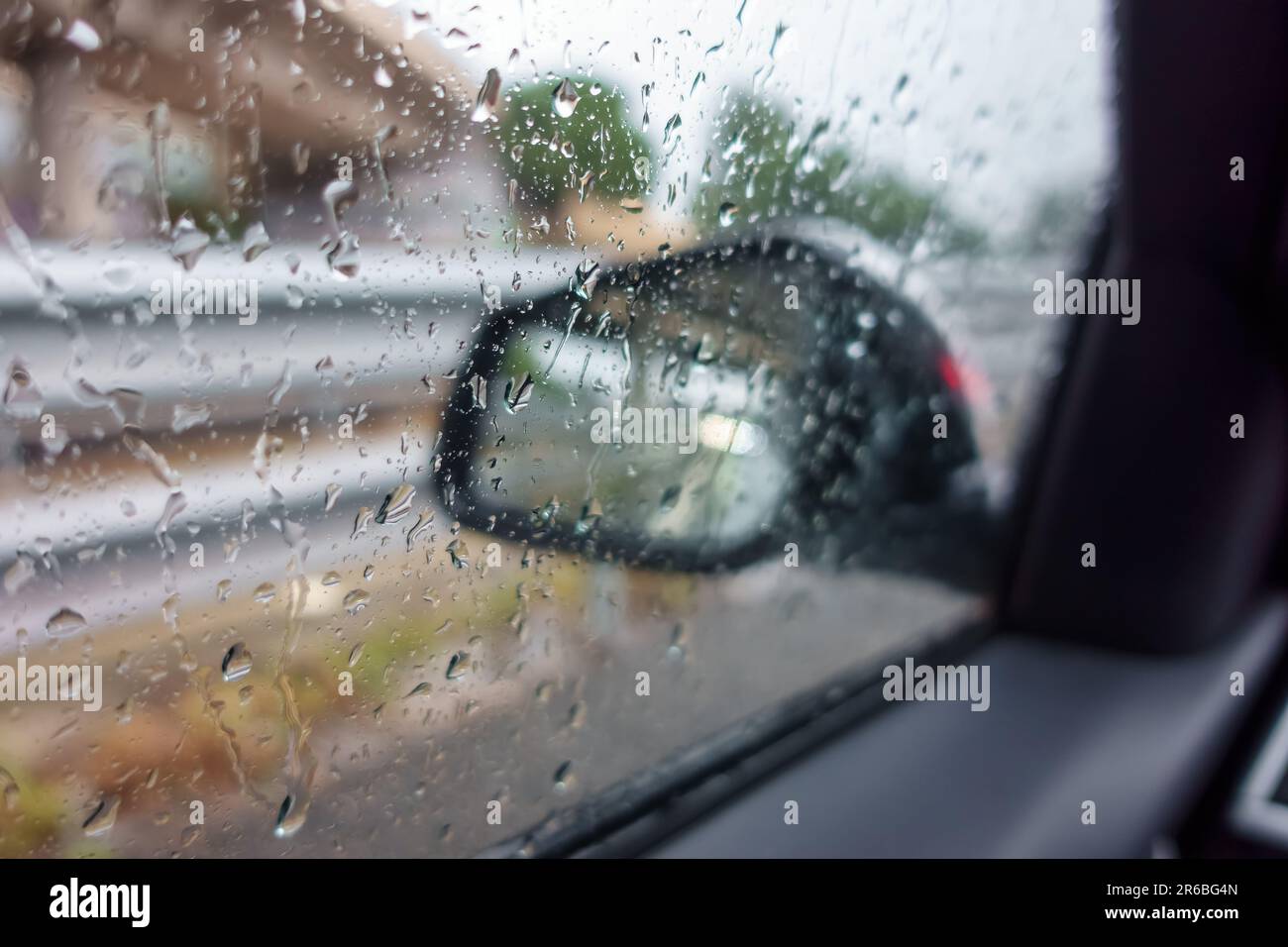 Car windows filled with water droplets due to the great storm falling ...