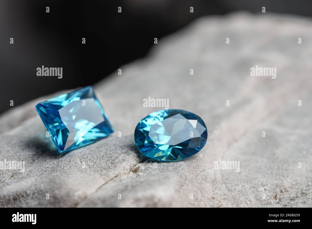 The glimmering natural hfhfhf sapphire gemstones on a rugged rock ...