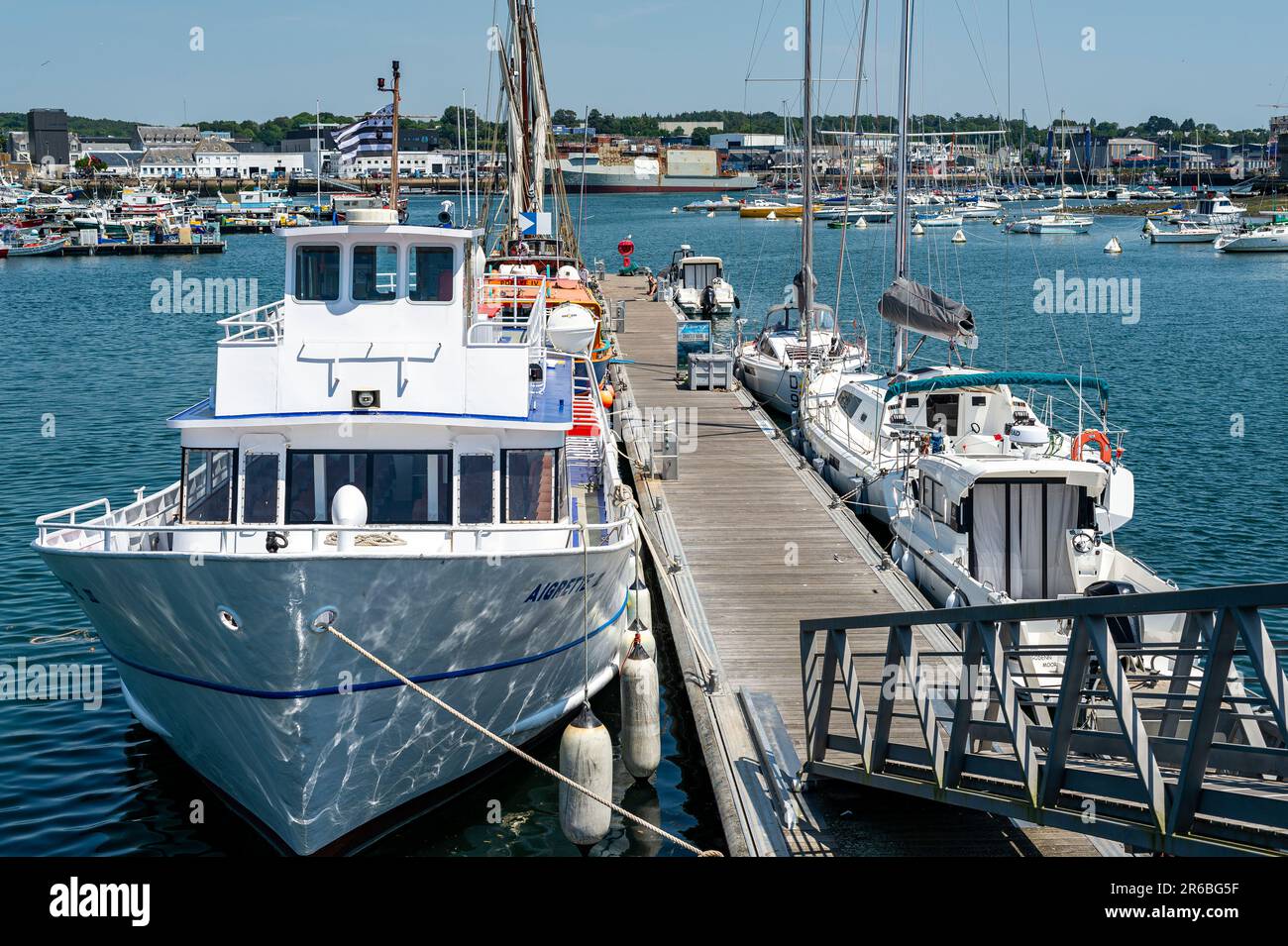 Touring boats in Concarneau harbor Brittany France. Beautiful colors of ...