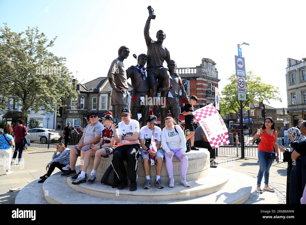 West Ham United fans sit around the Champions Statue prior to an open ...