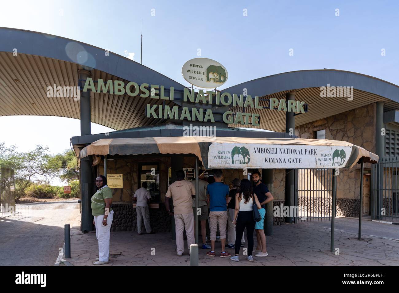 Kenya, Africa - March 5, 2023: Tourists and drivers wait in line at the ... Kenya, Africa - March 5, 2023: Tourists and drivers wait in line at the ...