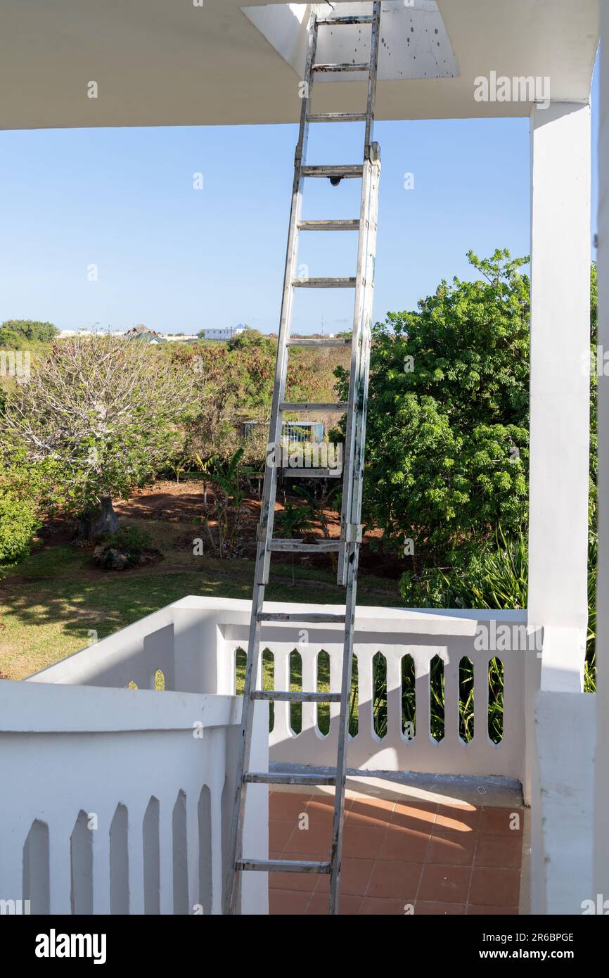 Unattendend ladder on a steep staircase, concept for a safety violation ...
