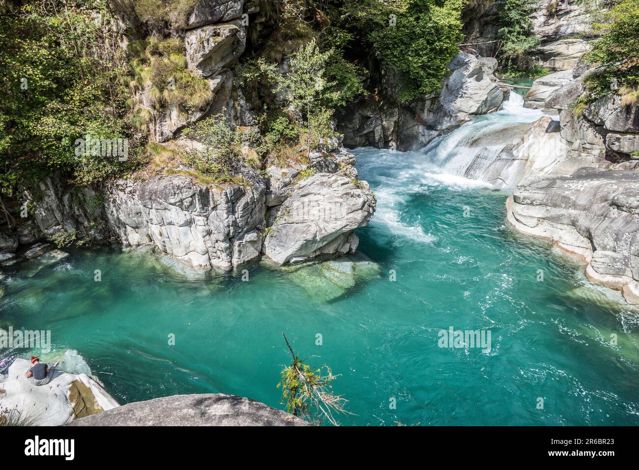 The Potholes of the Giants in the Toce River with green water and ...