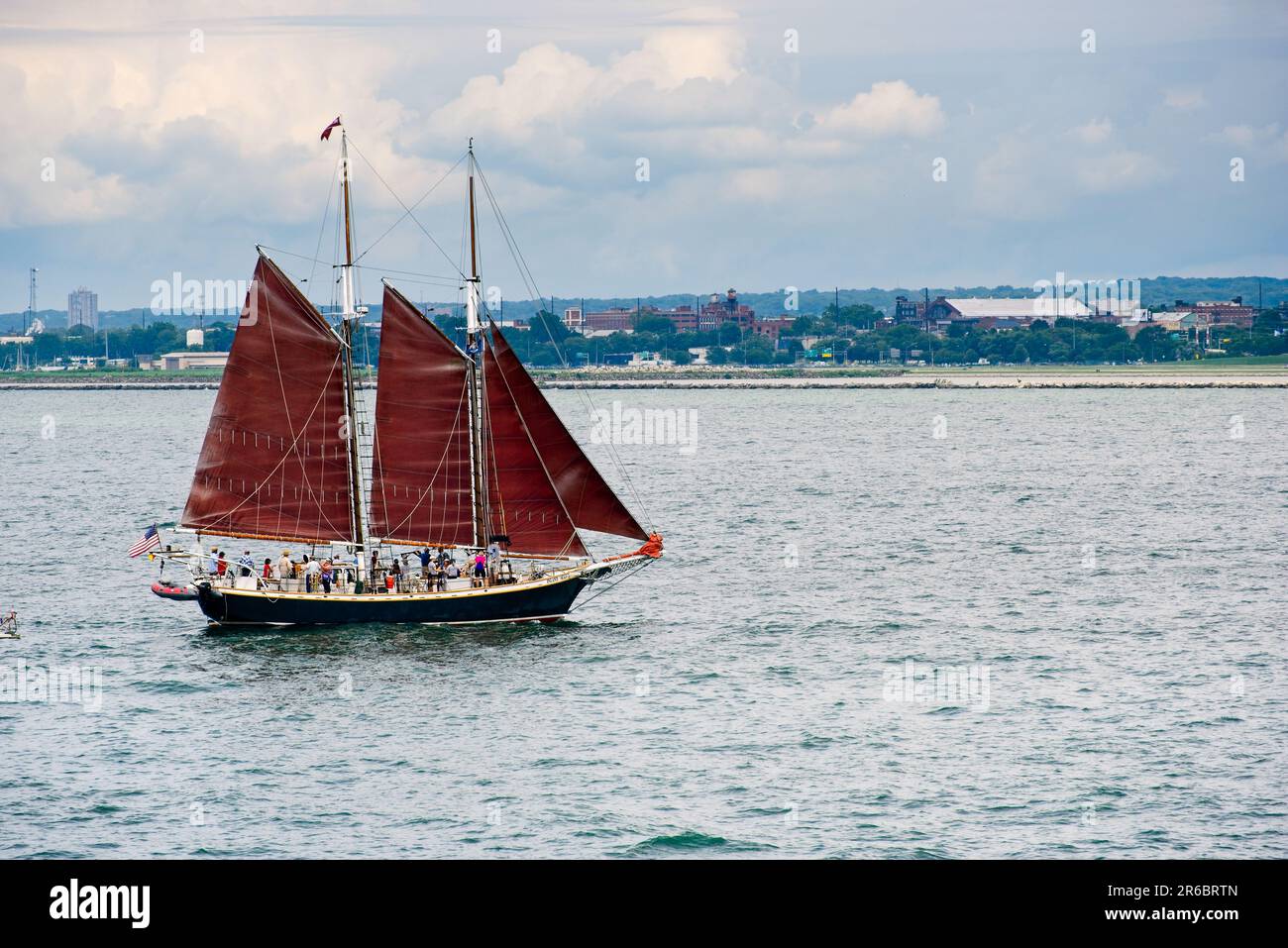 The tall ship Inland Seas, sails past the Cleveland shoreline on Lake ...