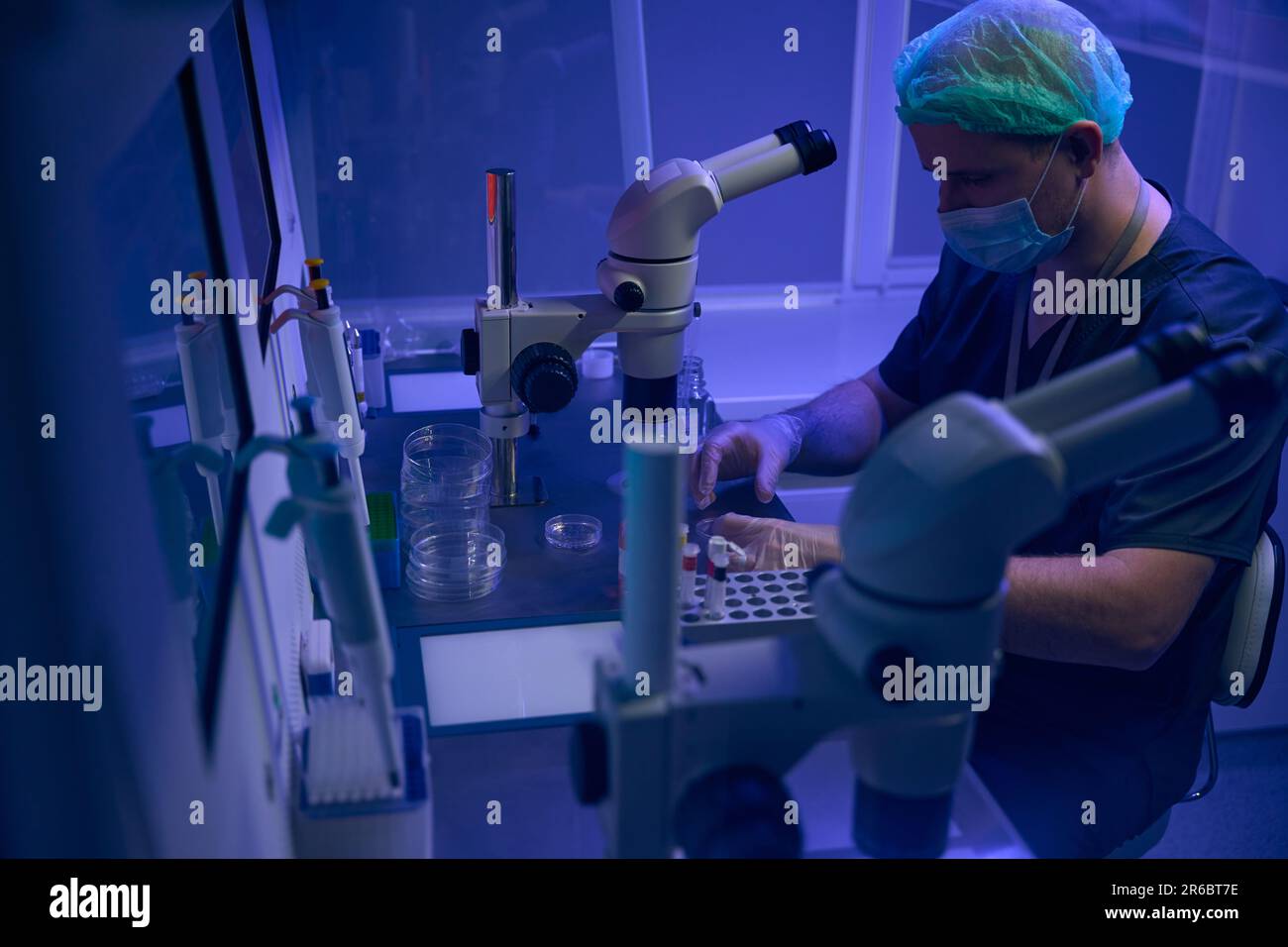 Male microbiologist working in laboratory in clinic Stock Photo - Alamy