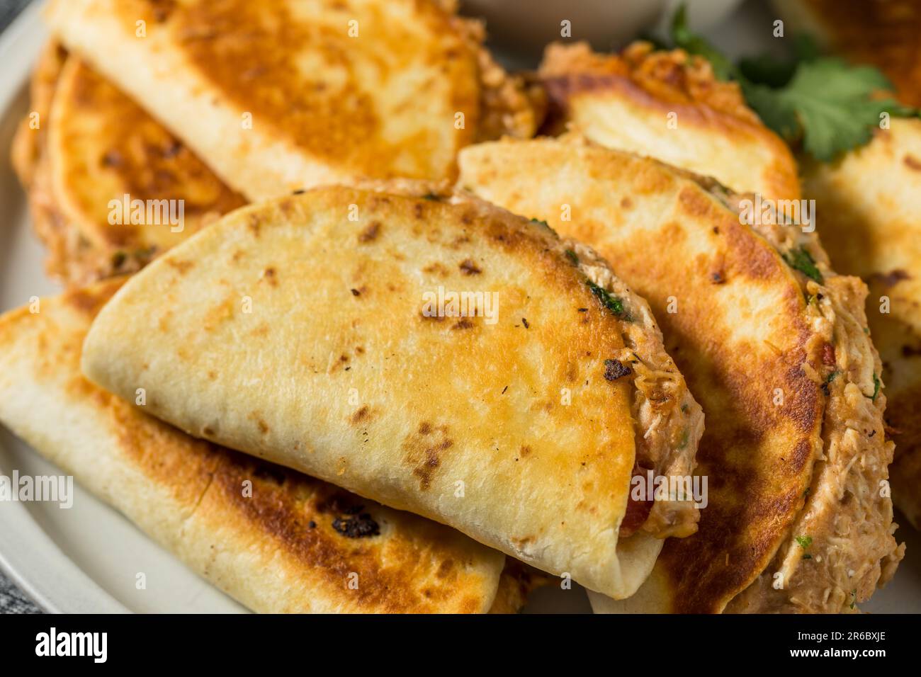 Homemade Mini Chicken Quesadillas with Salsa and Guac Stock Photo - Alamy
