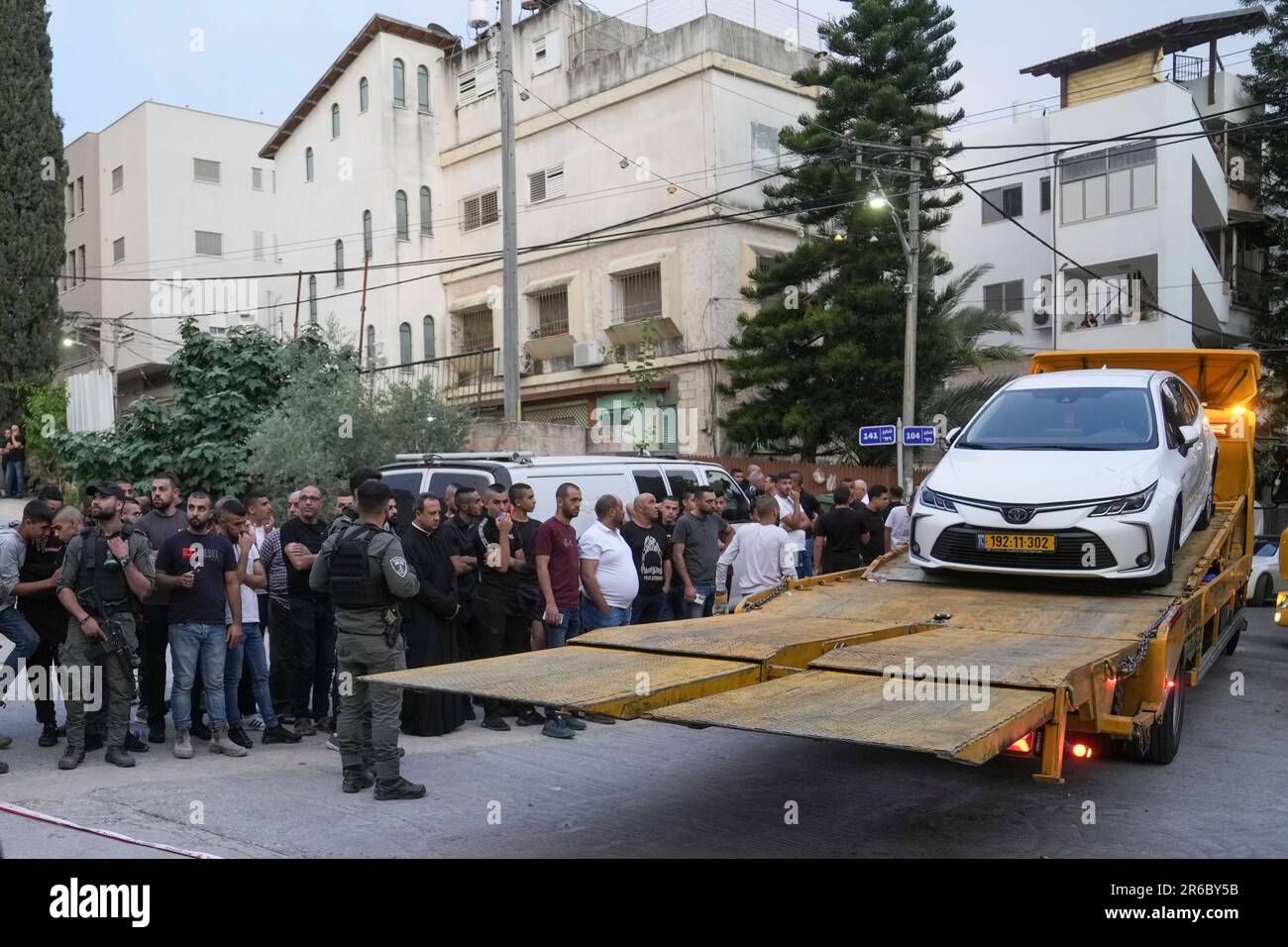 Israeli police examine the scene of a shooting where a gunman opened ...