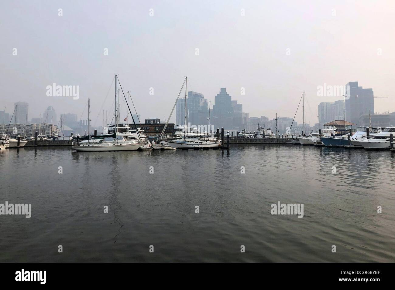 Smoke from Canadian wildfires obscure buildings in this view of ...
