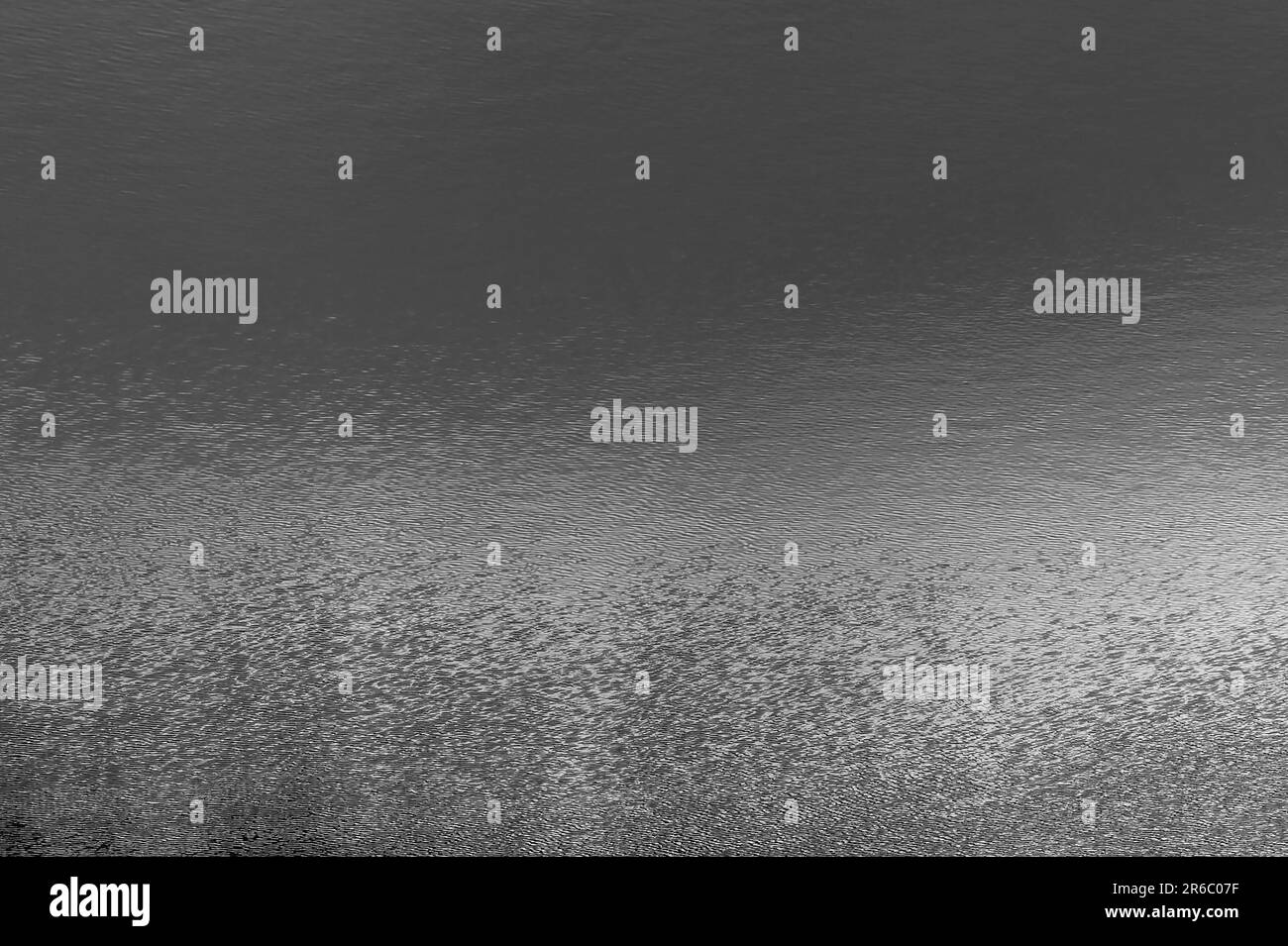 Black water surface with waves. Water ripples. Texture of the water ...