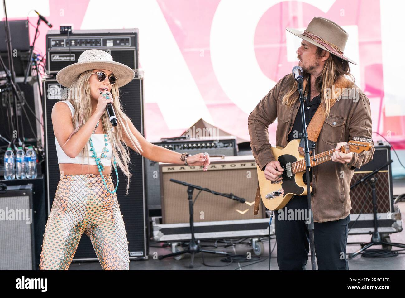 Lainey Wilson, left, and Lukas Nelson perform during the 2023 CMA Fest ...