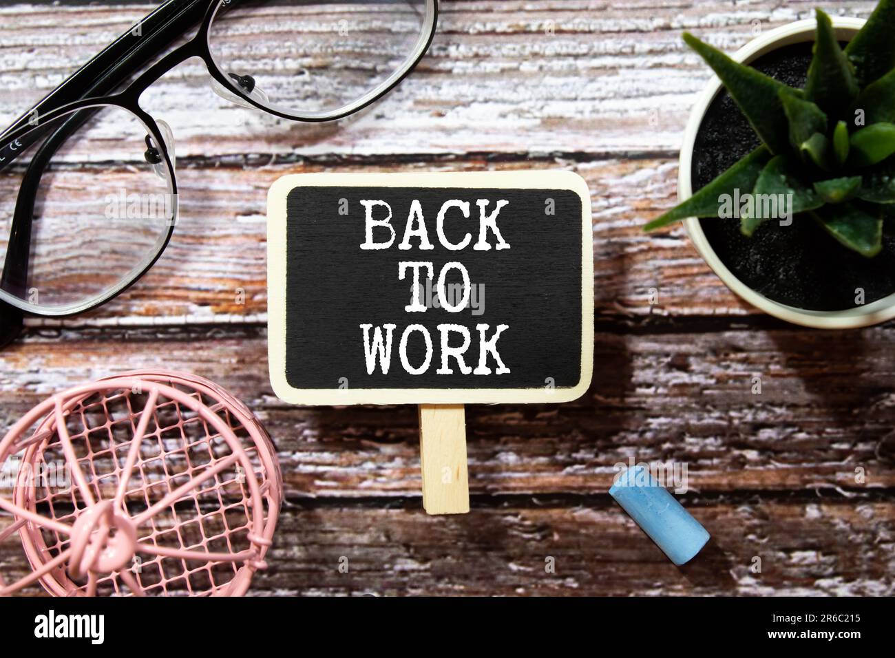 A sign saying back to work. The felt sign has removable letters than ...