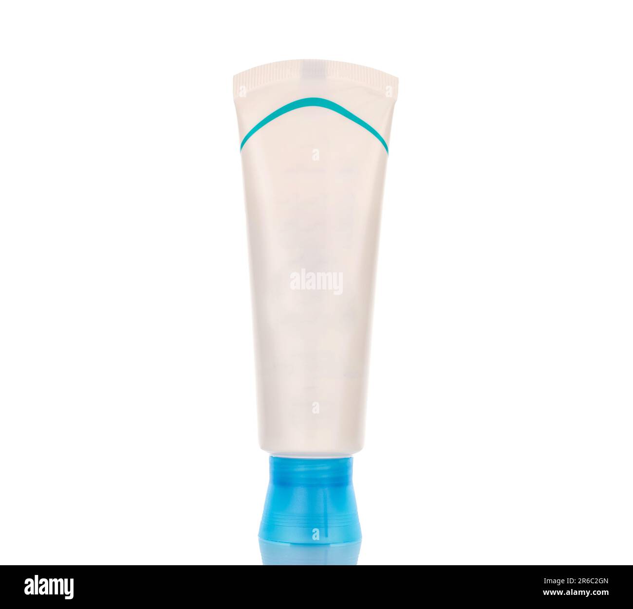 One plastic tube of toothpaste, macro, isolated on white background ...