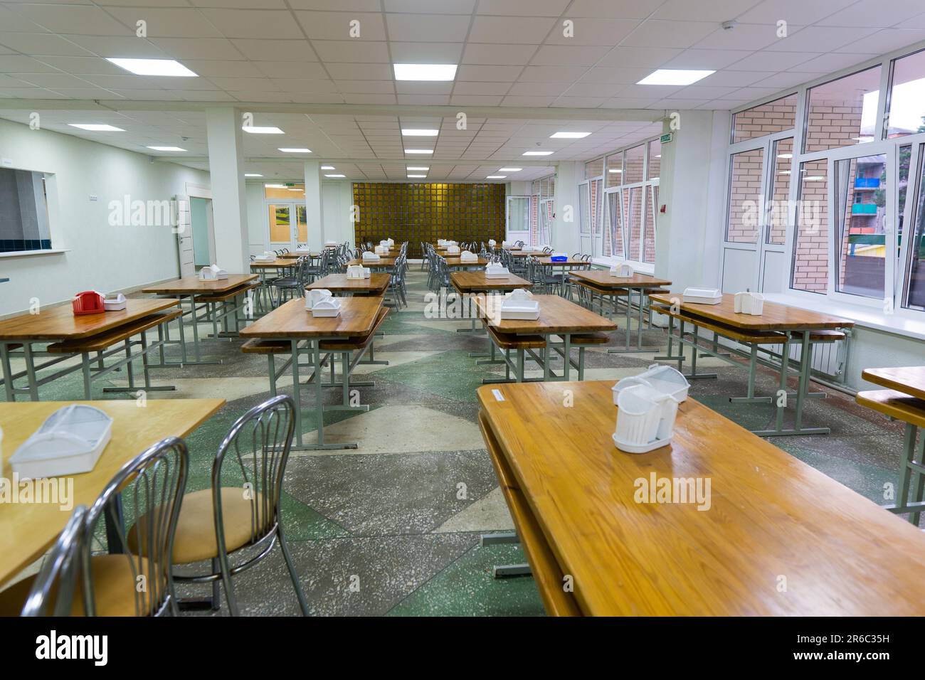 Chairs and tables. The dining hall in school is quarantined, isolation ...