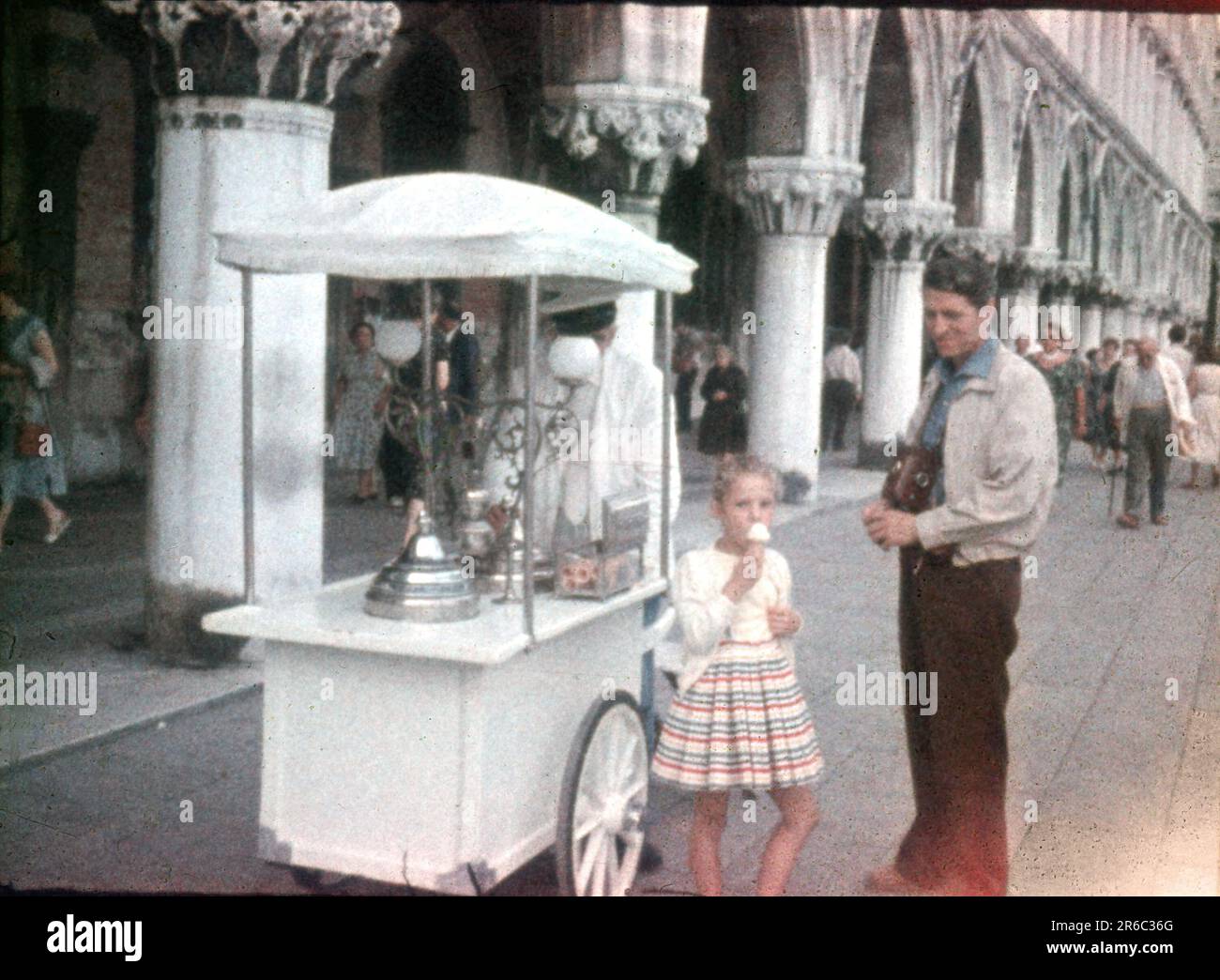 1950s Venice Italy, Man and girl at gelato stand in St. Mark's Square ...