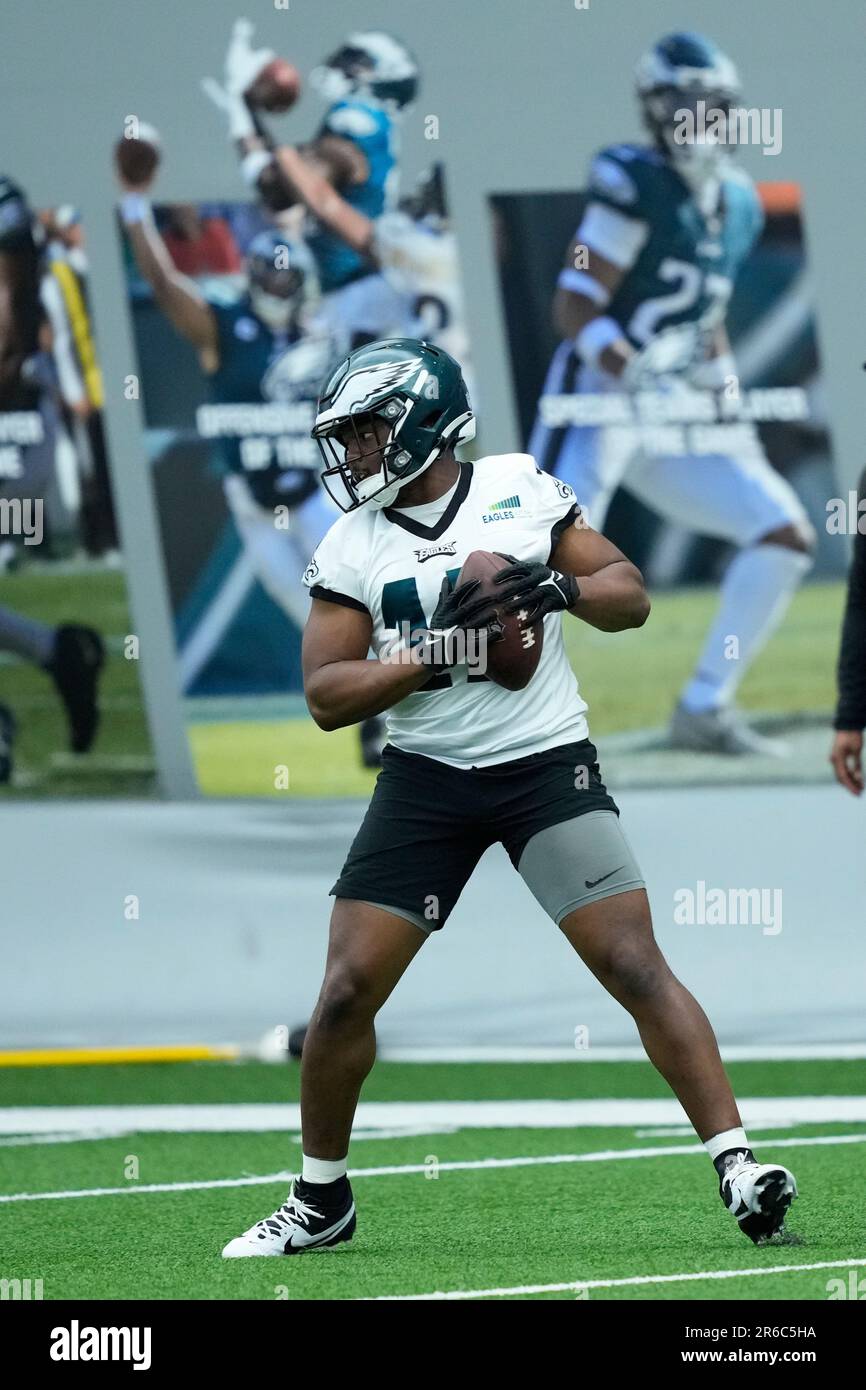 Philadelphia Eagles' Nakobe Dean runs a drill during practice at the ...