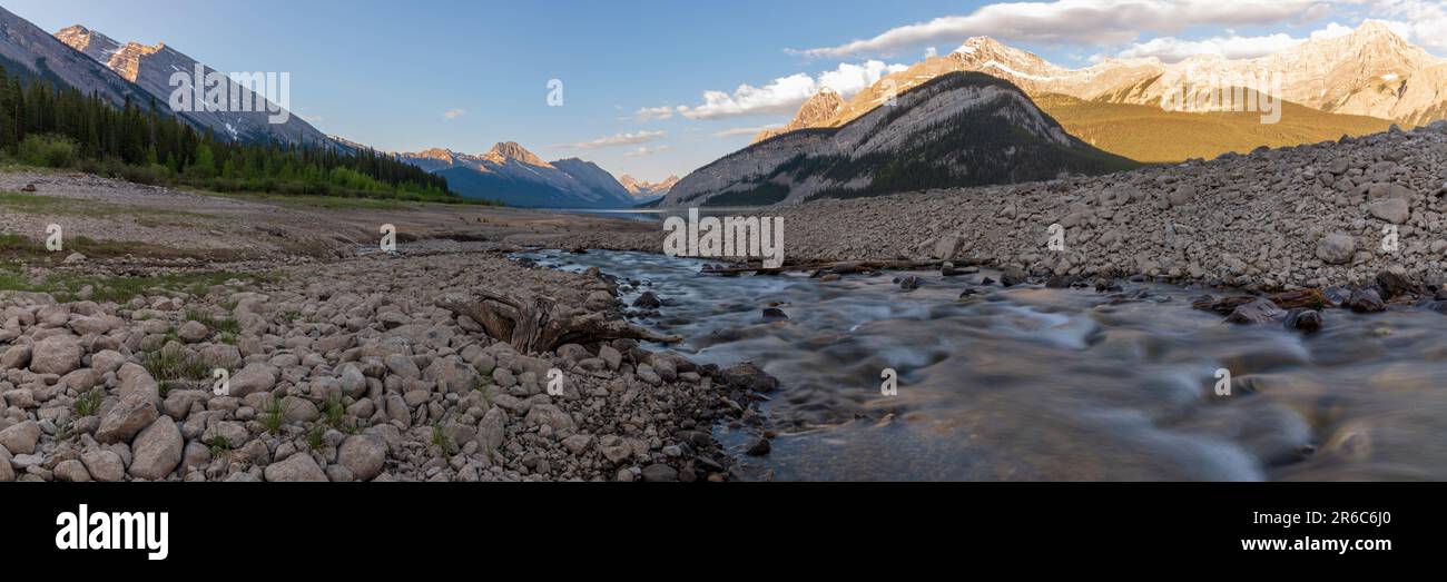 Wilderness view in Kananaskis with mountains, creek, stream running ...