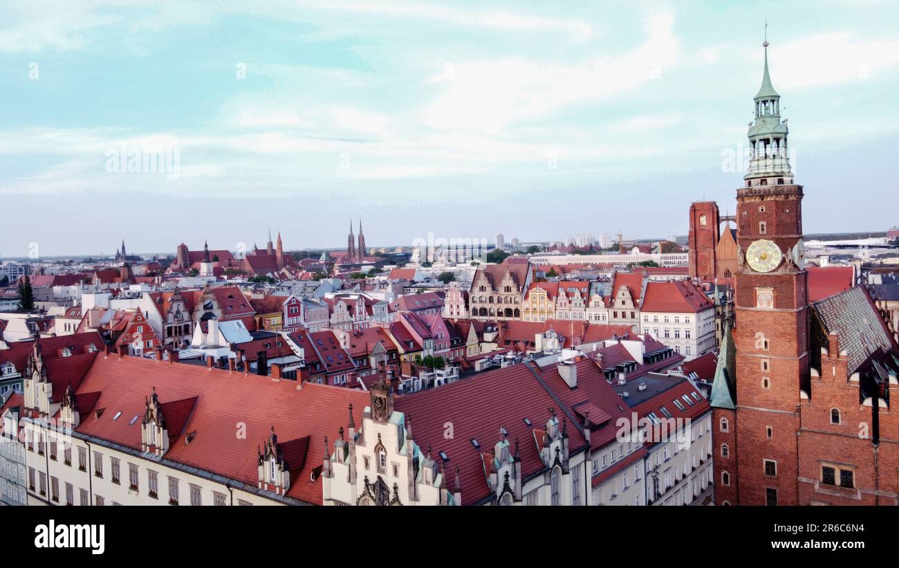 Aeril view on Old town with town hall (clock tower) and red tiled roofs ...