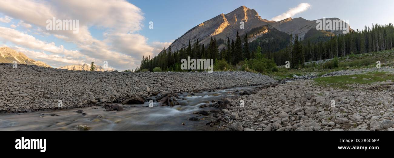 Wilderness view in Kananaskis with mountains, creek, stream running ...
