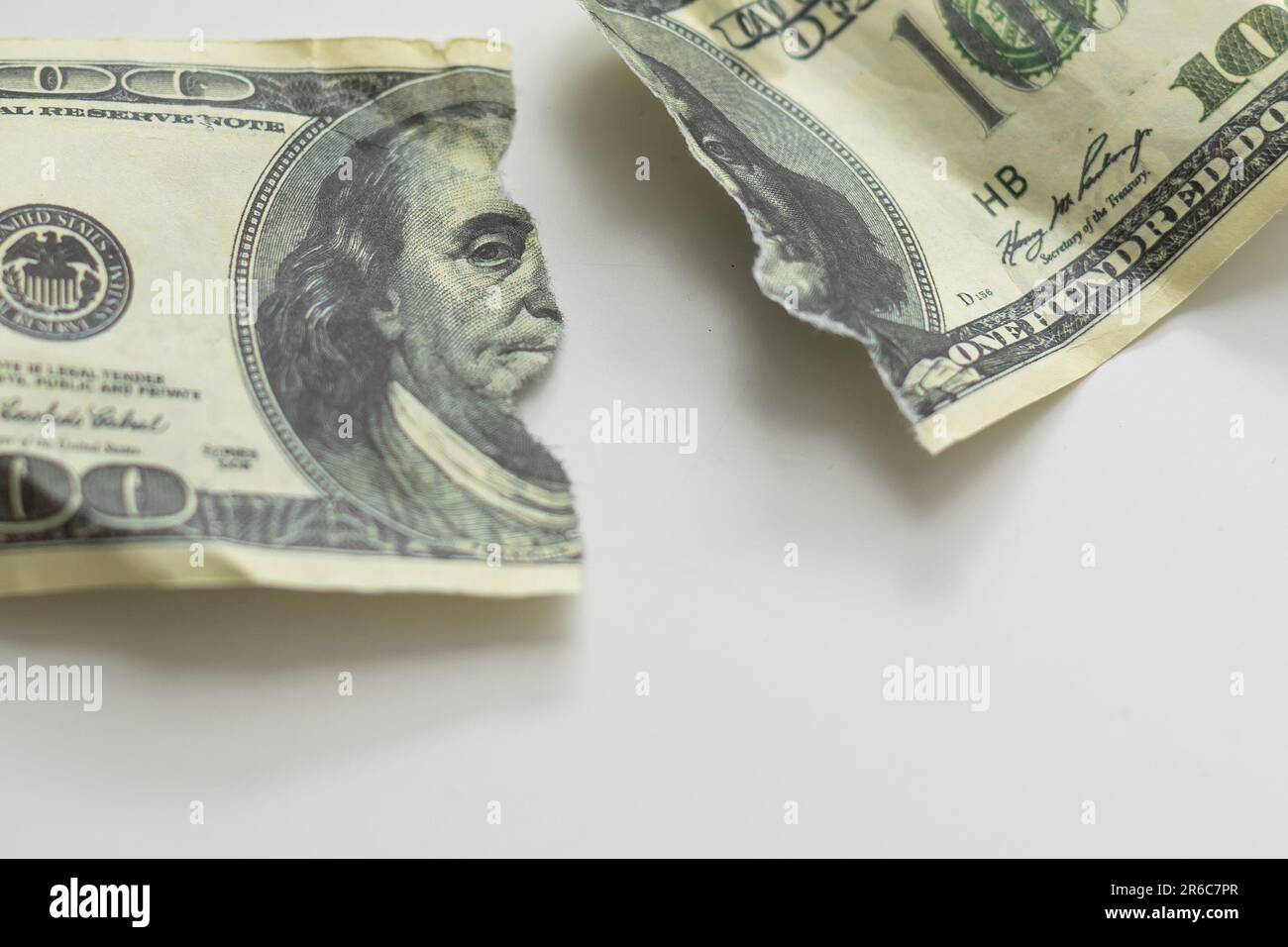 A Torn One Hundred Dollar Bill. Isolated on white. XXXL Stock Photo - Alamy