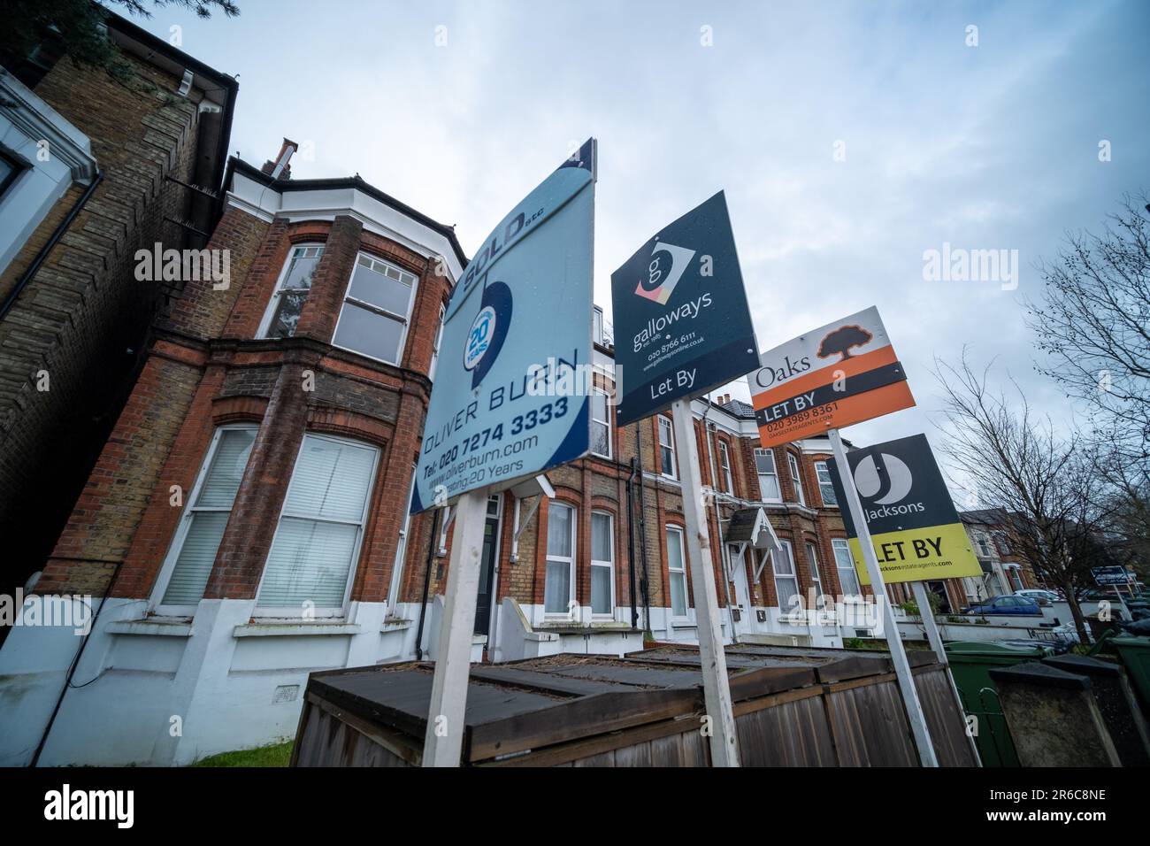 London- March 01, 2023: Estate agent signs on street of terraced ...