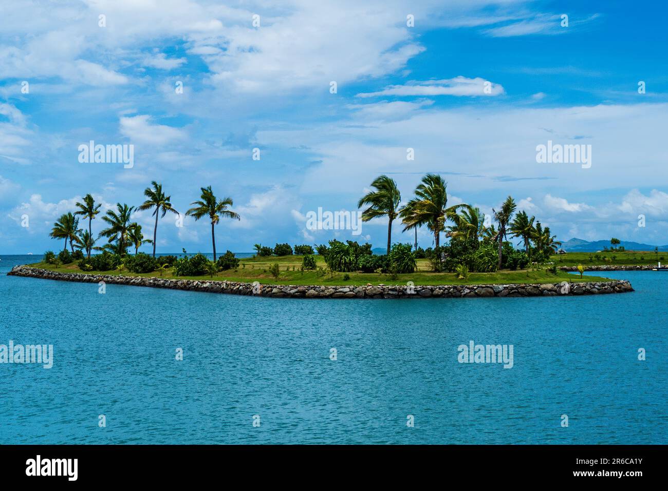 A wide angle photo of a small parcel of land jutting into the Pacific ...