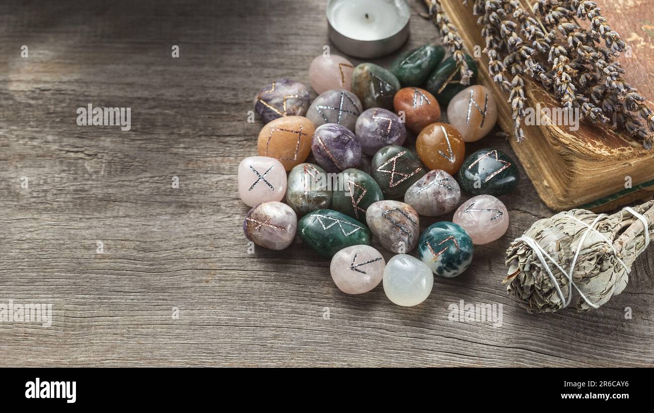 Elder Futhark Rune Stones Set Made of Natural Gemstones on Wooden ...