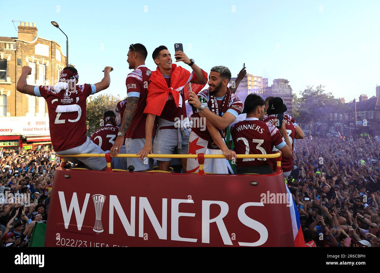 West Ham United players parade through Stratford, London, following ...