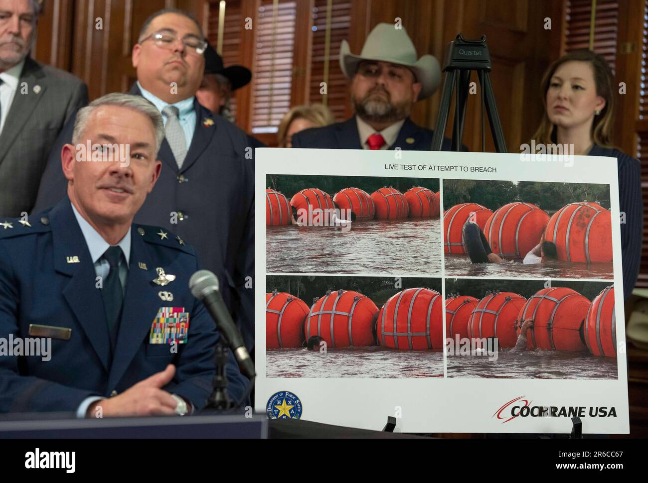 Major General THOMAS SUELZER of the Texas Military Department shows a ...