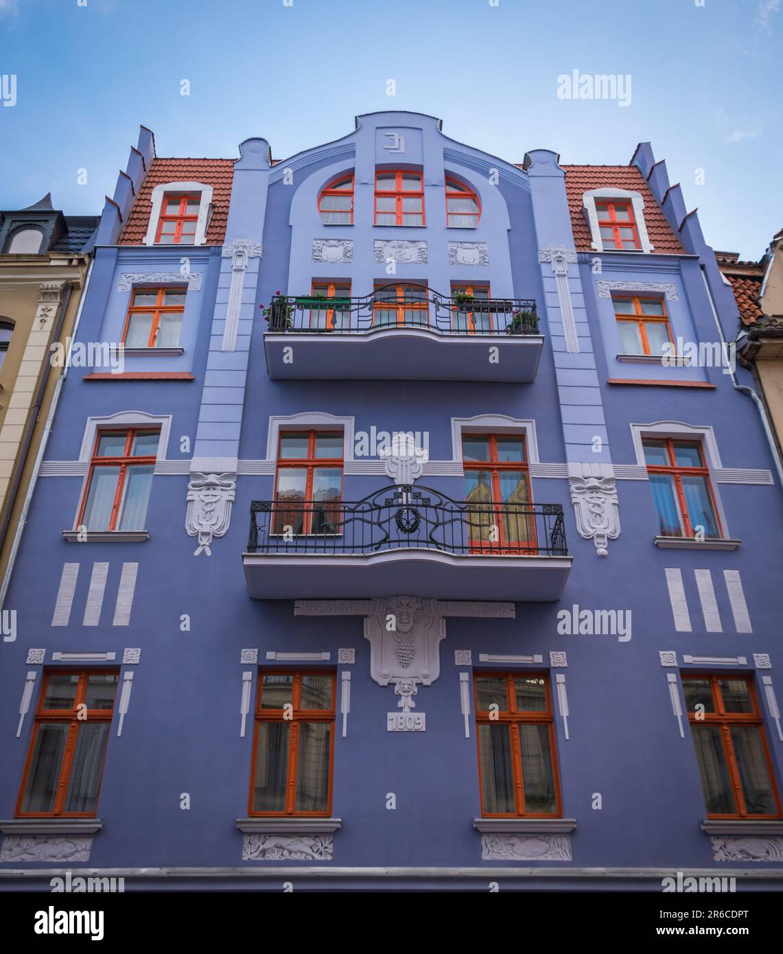 Front of a beautiful blue house in Torun old town Stock Photo - Alamy